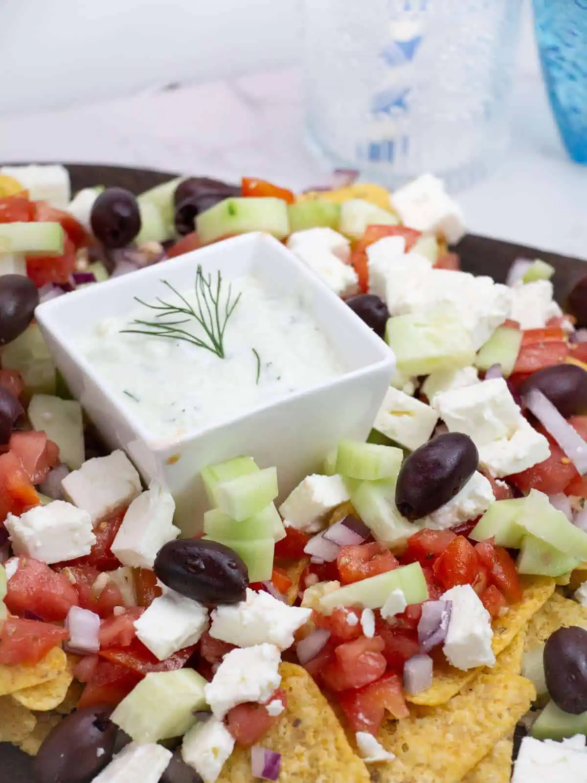 Easy Greek Nachos with Tzaziki - Little Nomads Recipes