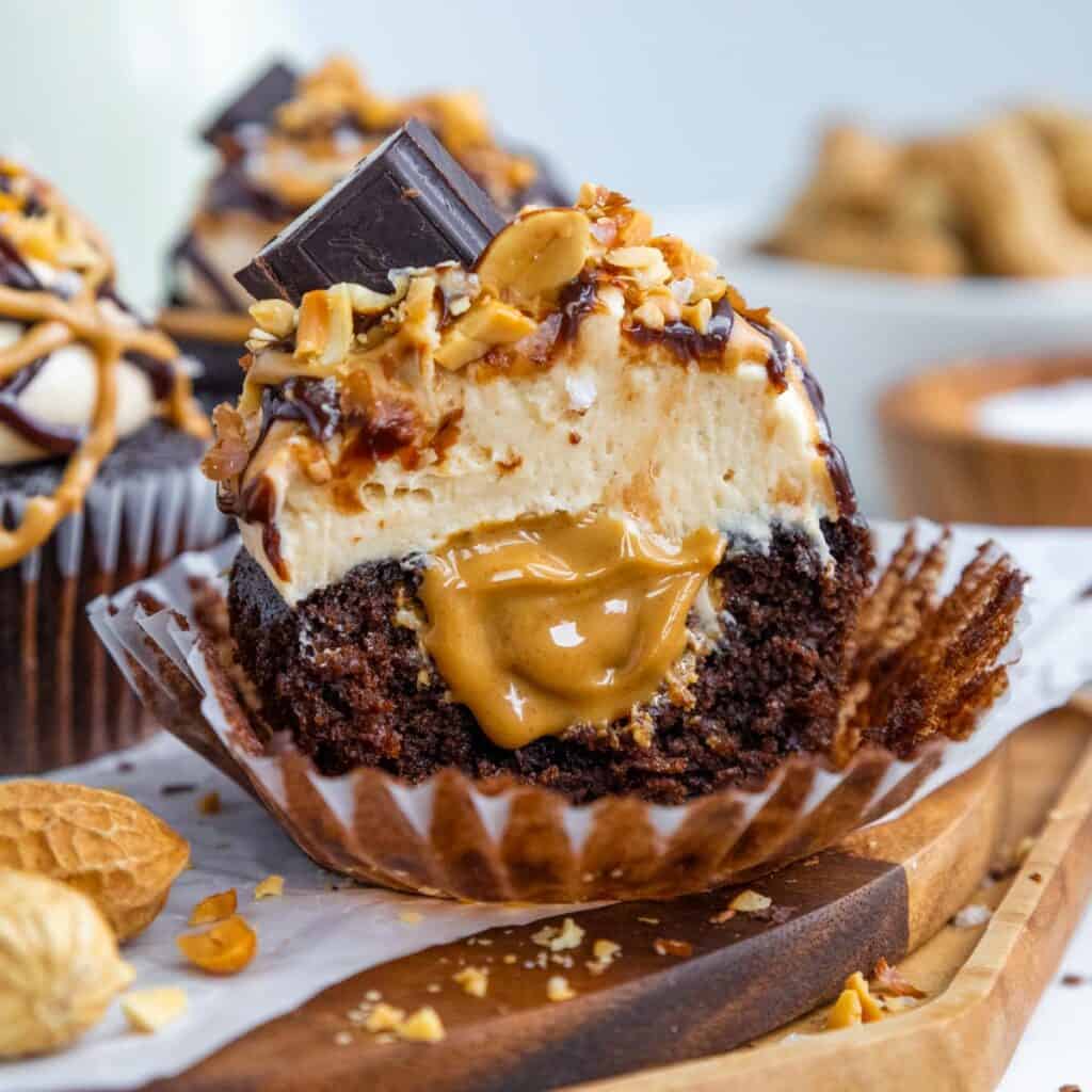 Gooey Peanut Butter-Filled Cupcakes with Chocolate Drizzle